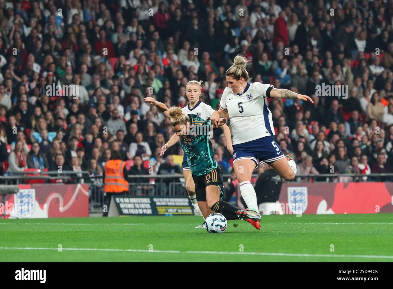 Millie Bright of England fouls Linda Dallmann of Germany in the 18 yard ...