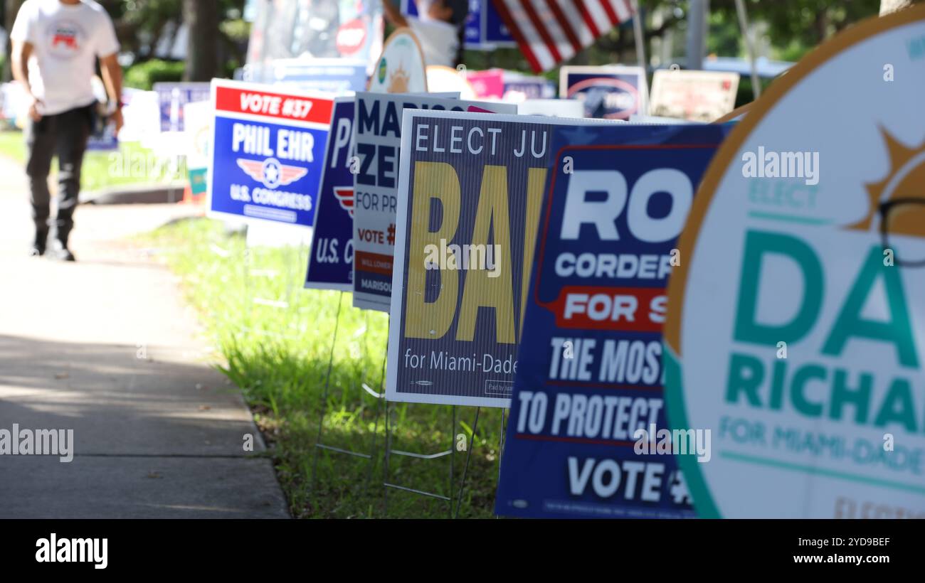 Cluster of Election signs in front of Public Library at Miami Dade ...