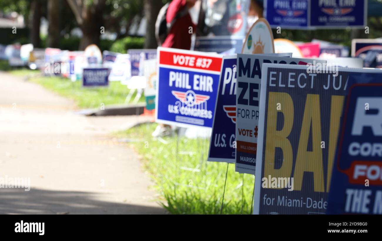 Cluster of Election signs in front of Public Library at Miami Dade ...