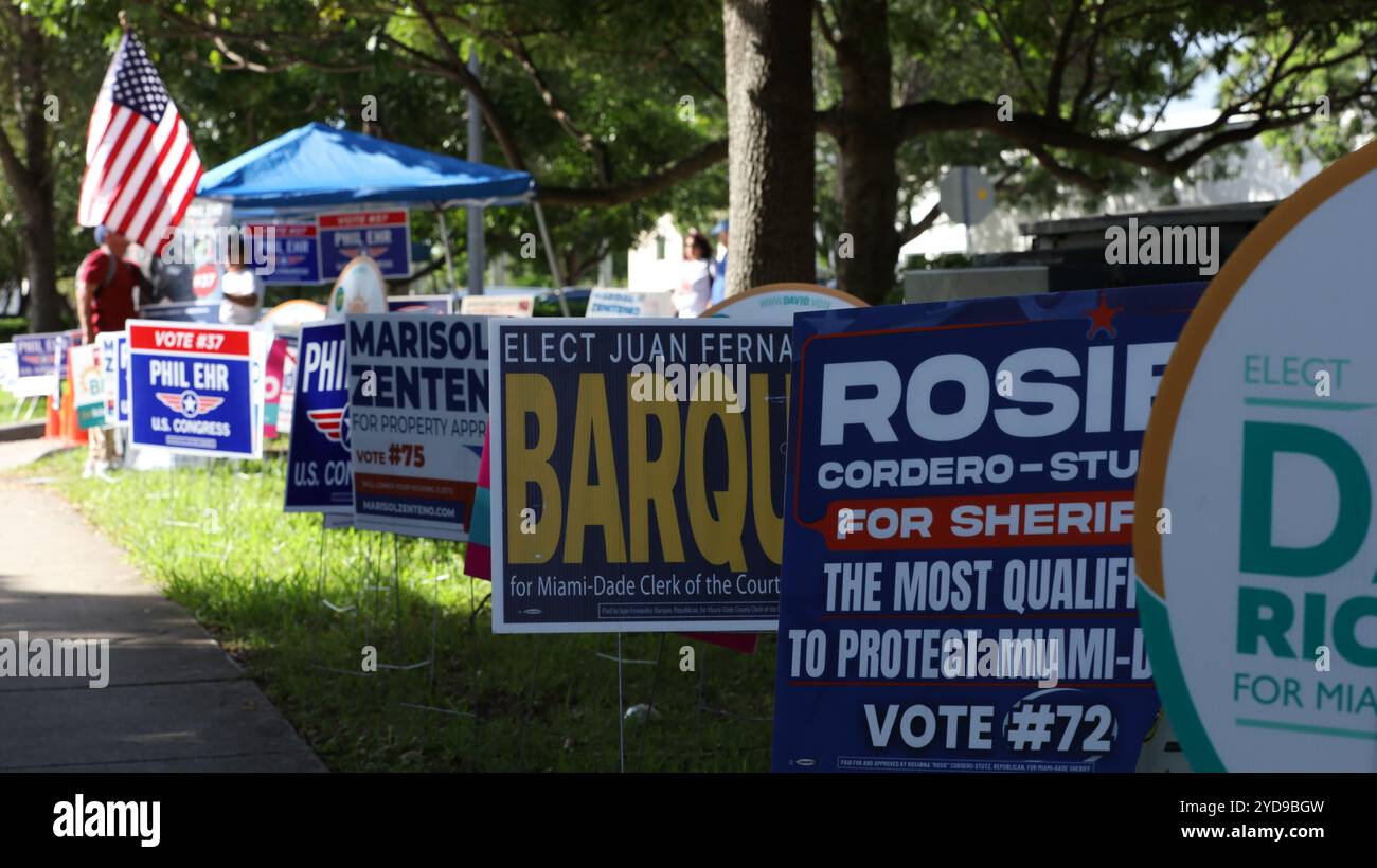 Cluster of Election signs in front of Public Library at Miami Dade ...