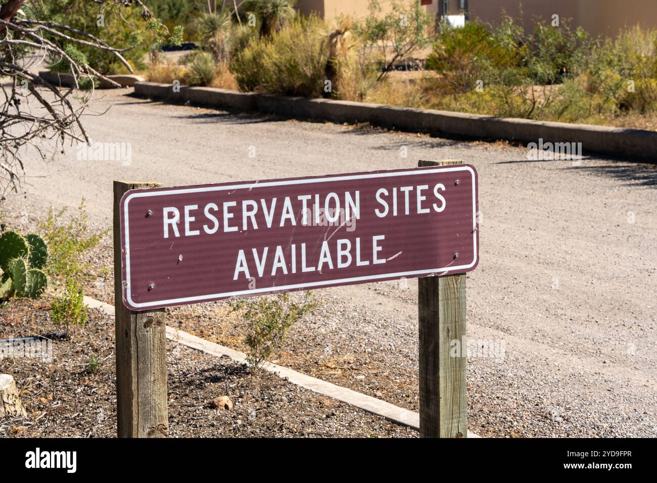 Sign that says "Reservation Sites Available" is on a post. The sign is ...
