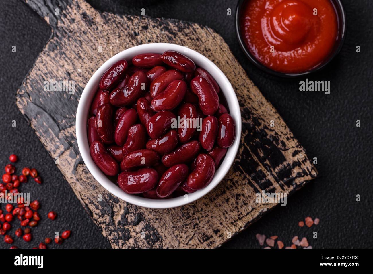 Canned red beans with salt and spices in a white bowl Stock Photo - Alamy