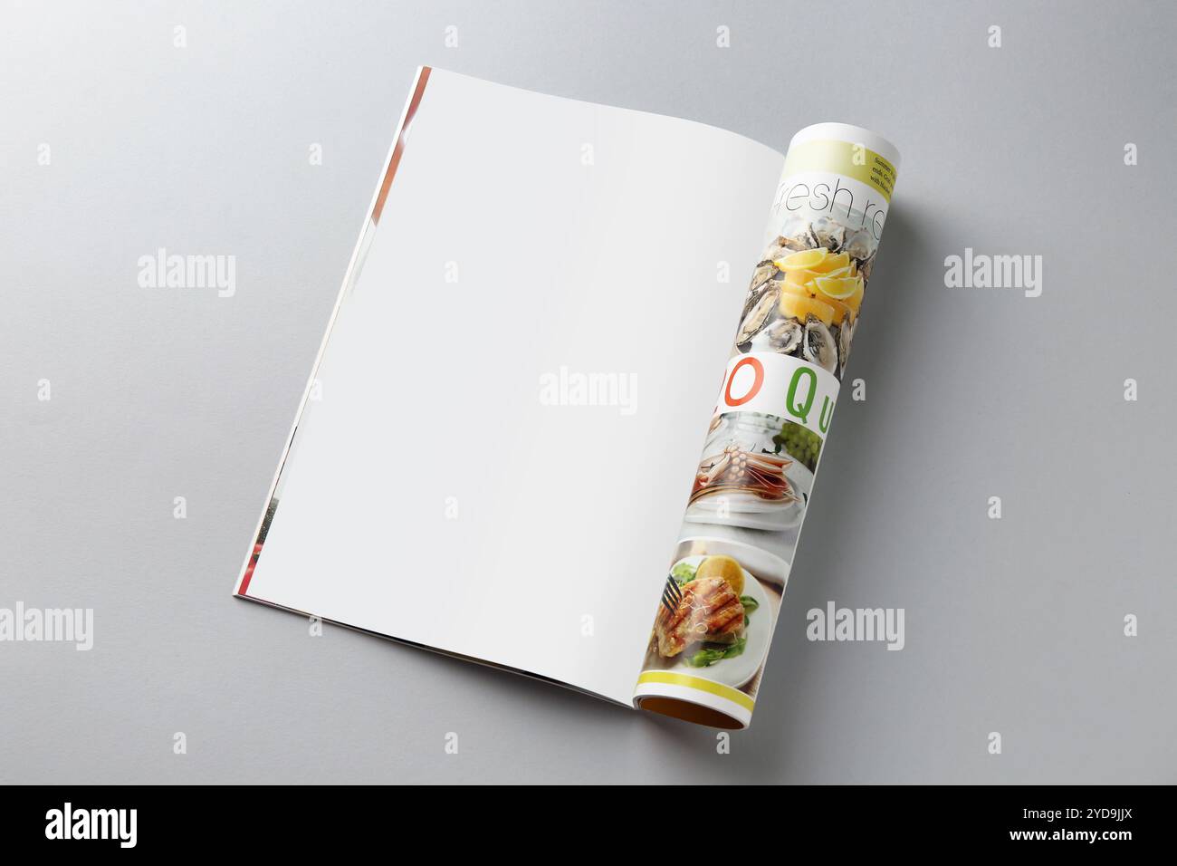 Open magazine on grey background. Mockup for design Stock Photo - Alamy