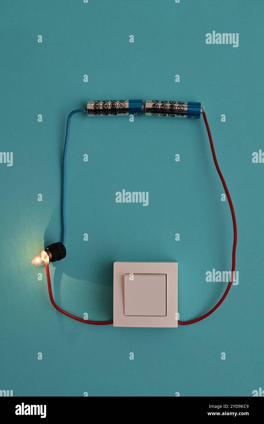 Educational low-voltage electrical circuit including battery, switch ...