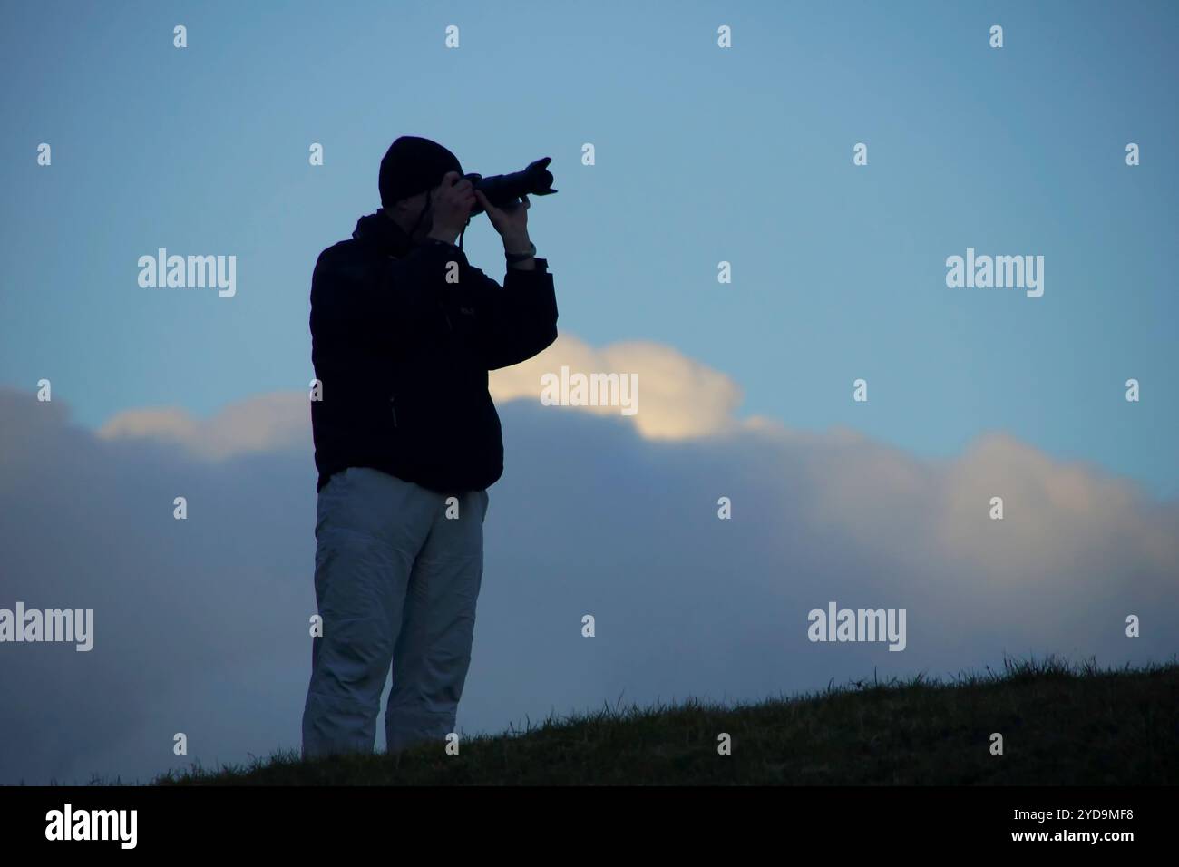 Male amateur photographer camera hi-res stock photography and images ...