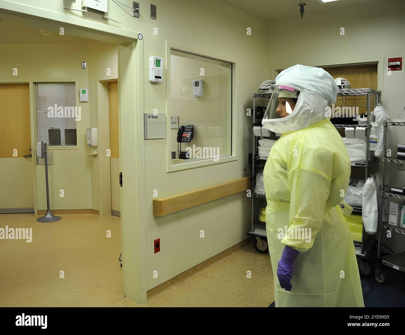 Nurse wearing protective gear in the NIH Clinical Center Special ...