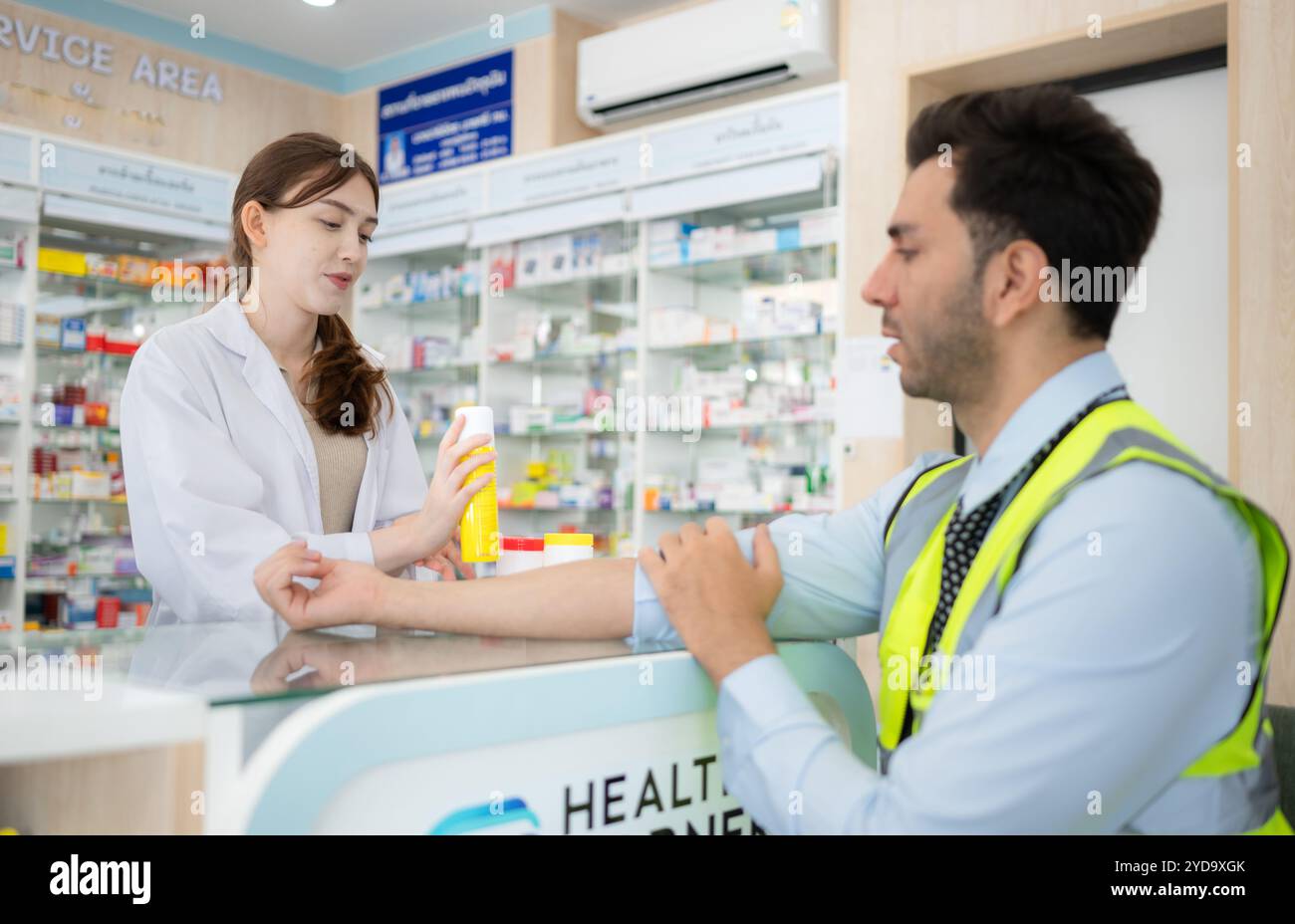 Pharmacist explains medical information hi-res stock photography and ...