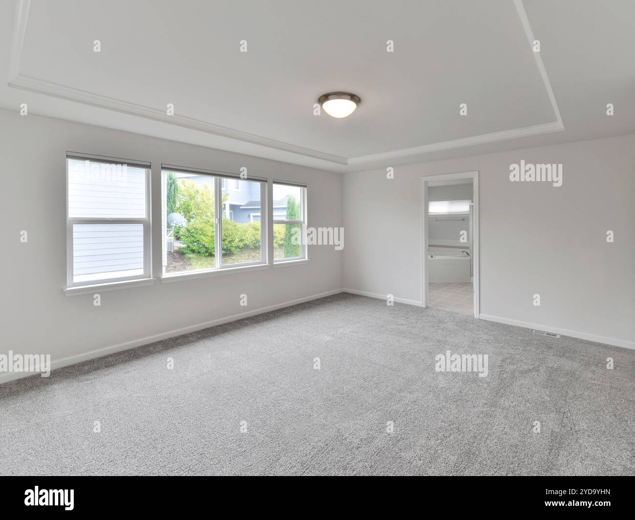 Modern residential empty bedroom interior Stock Photo - Alamy