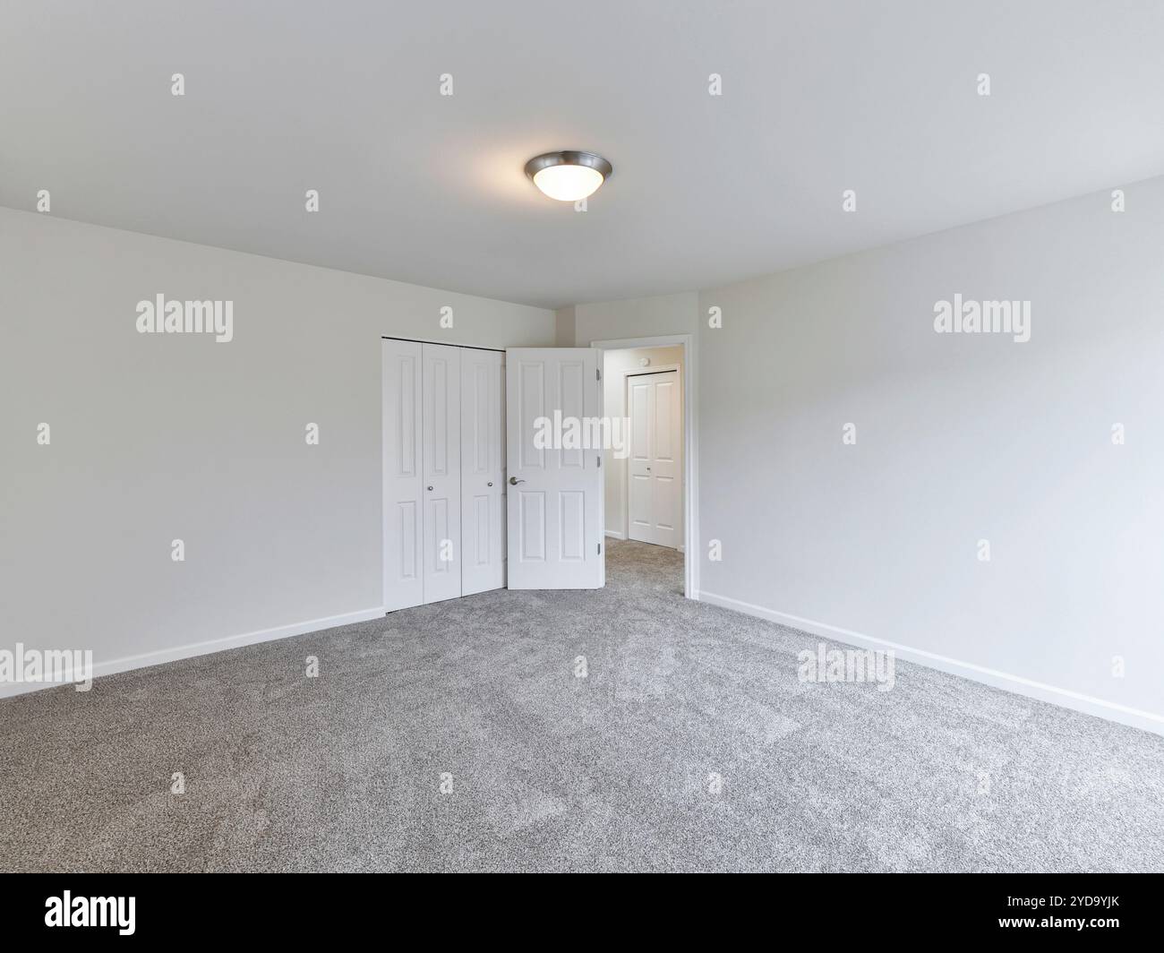 Modern residential empty bedroom interior Stock Photo - Alamy