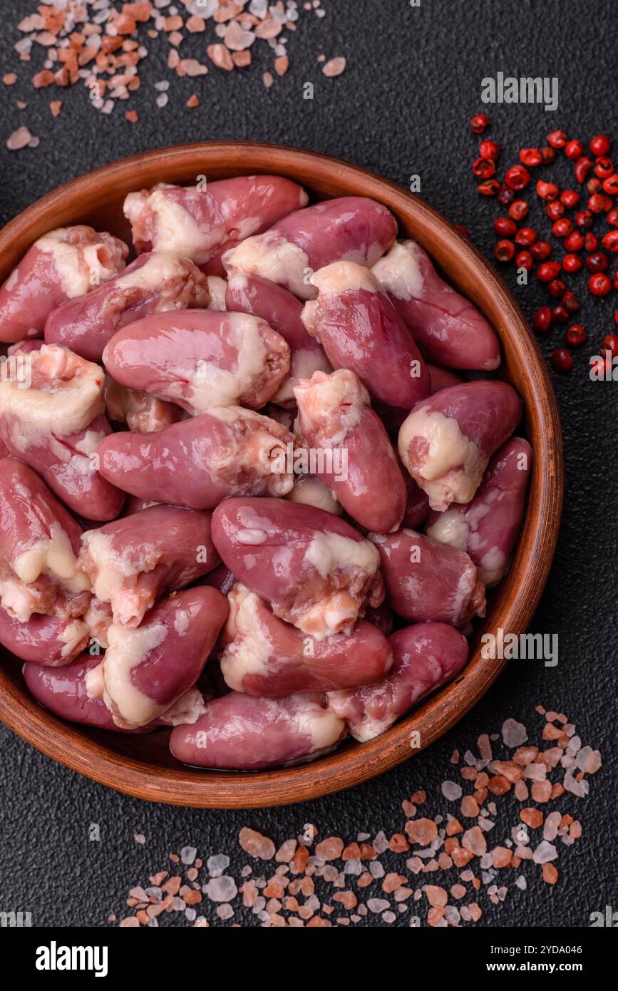 Raw chicken hearts with salt Stock Photo - Alamy
