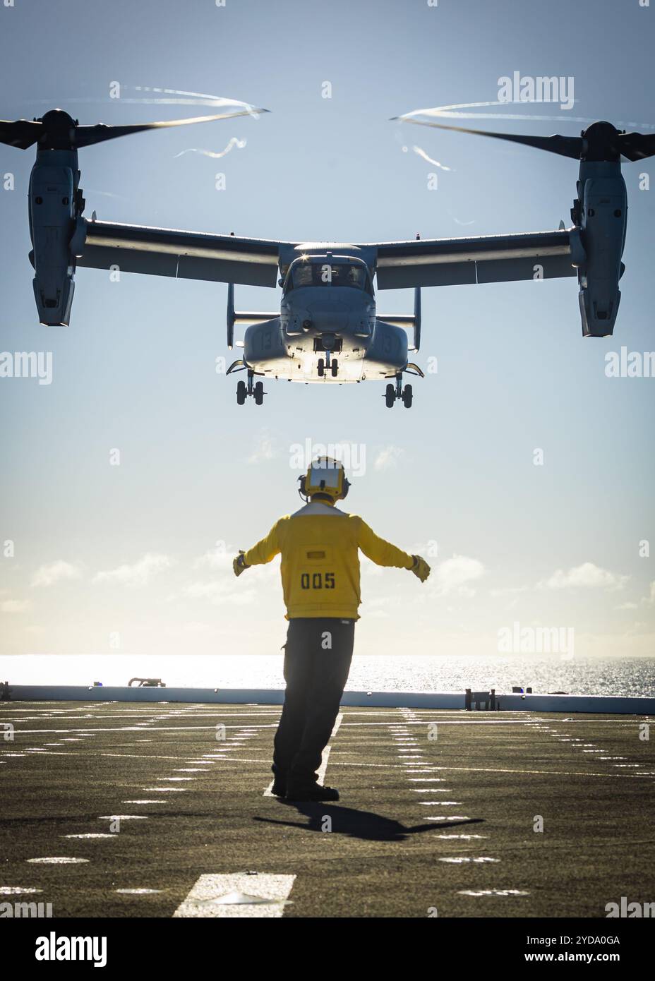 A U.S. Navy Sailor attached to the Expeditionary Sea Base (ESB) 6 USS ...
