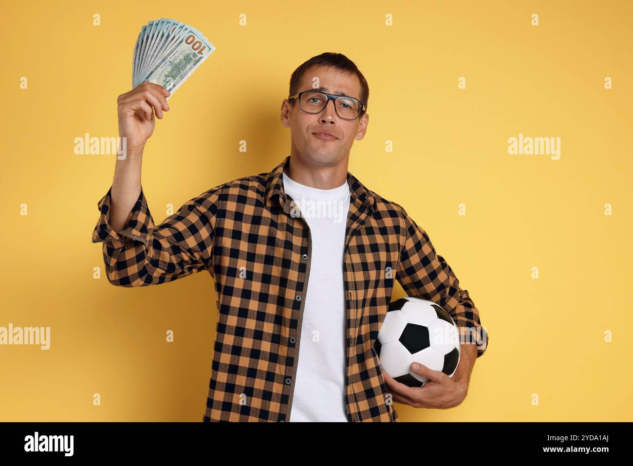 Money and soccer hi-res stock photography and images - Alamy