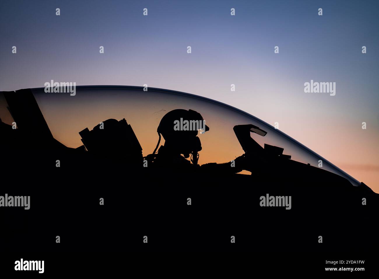 A 114th Fighter Wing F-16 Fighting Falcon being prepared for evening ...