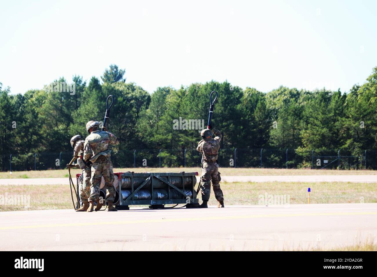 A CH-47 Chinook and crew with the 7th Battalion, 158th Aviation Regiment of New Century, Kansas ...