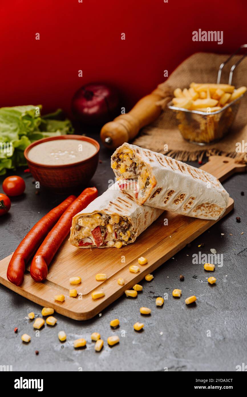 Grilled wrap filled with sausage, corn, and melted cheese. Hearty meal ...
