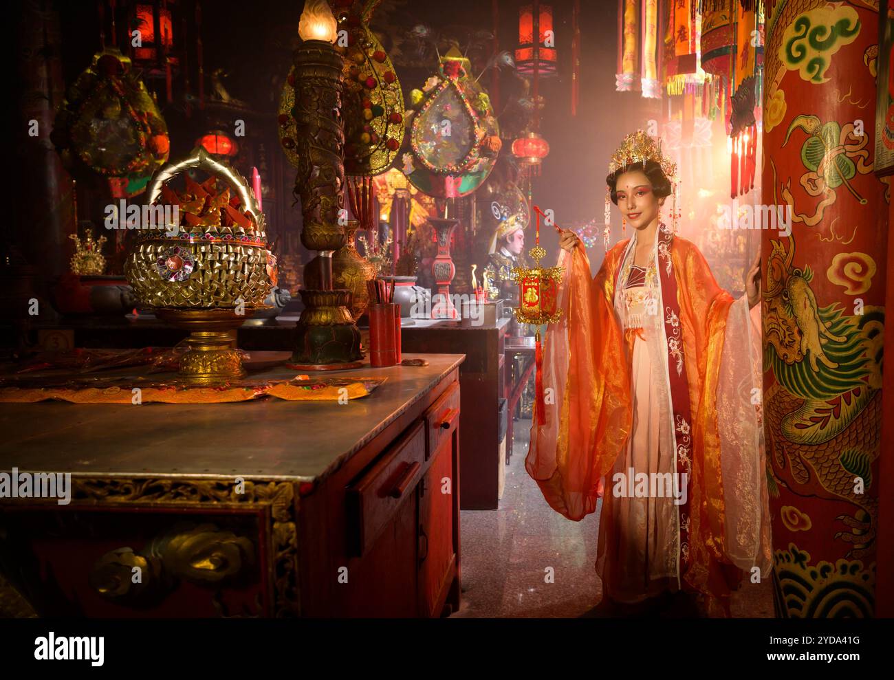 Portrait of a Chinese woman with a hand lantern In sacred shrines or ...