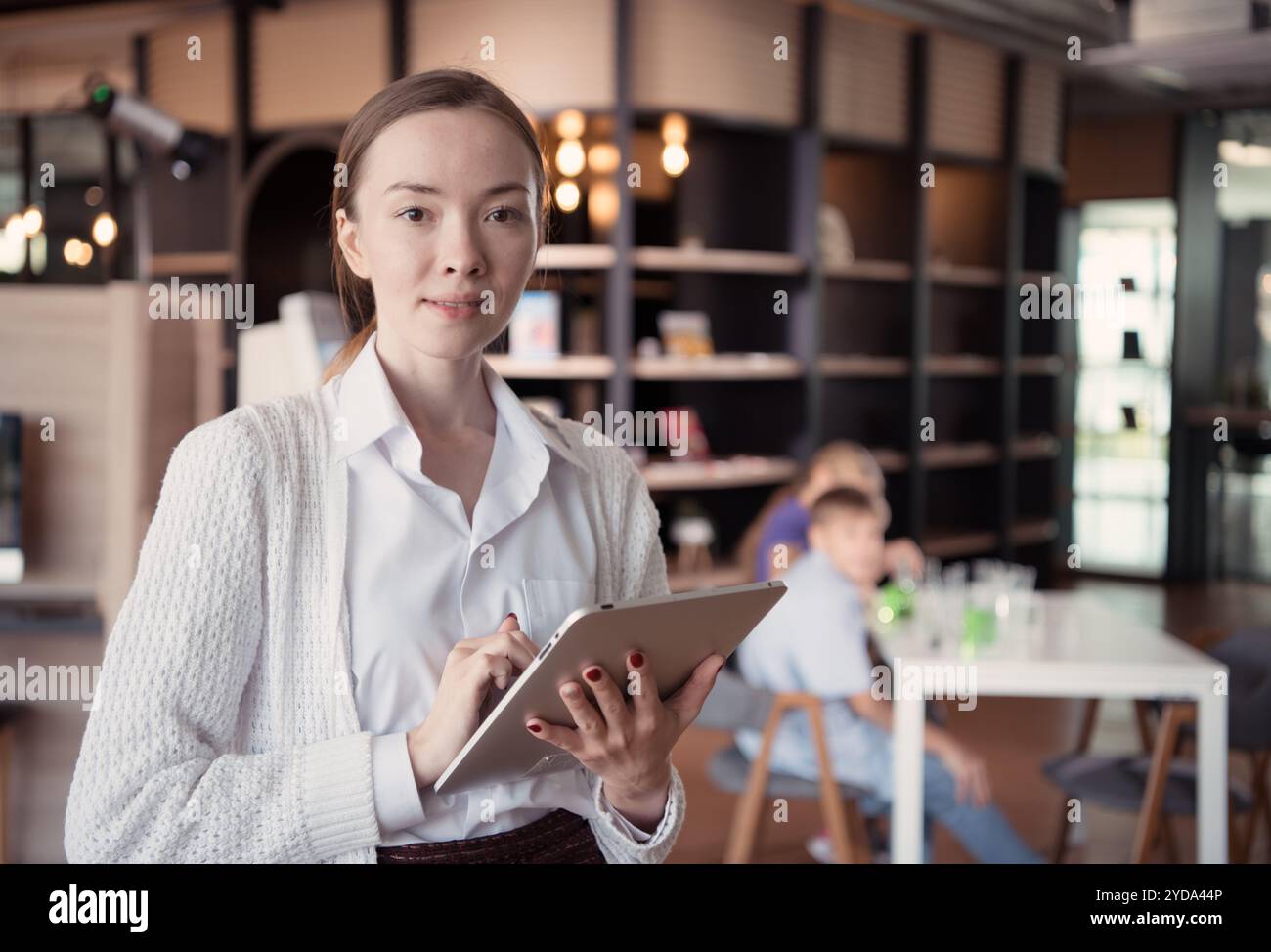 Science classroom teacher review lesson plans before teaching students ...