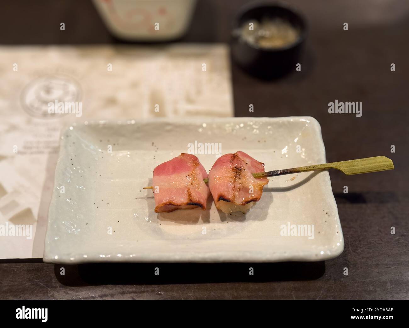 Enjoy the rich flavors of skewered meat appetizers that are a staple in ...