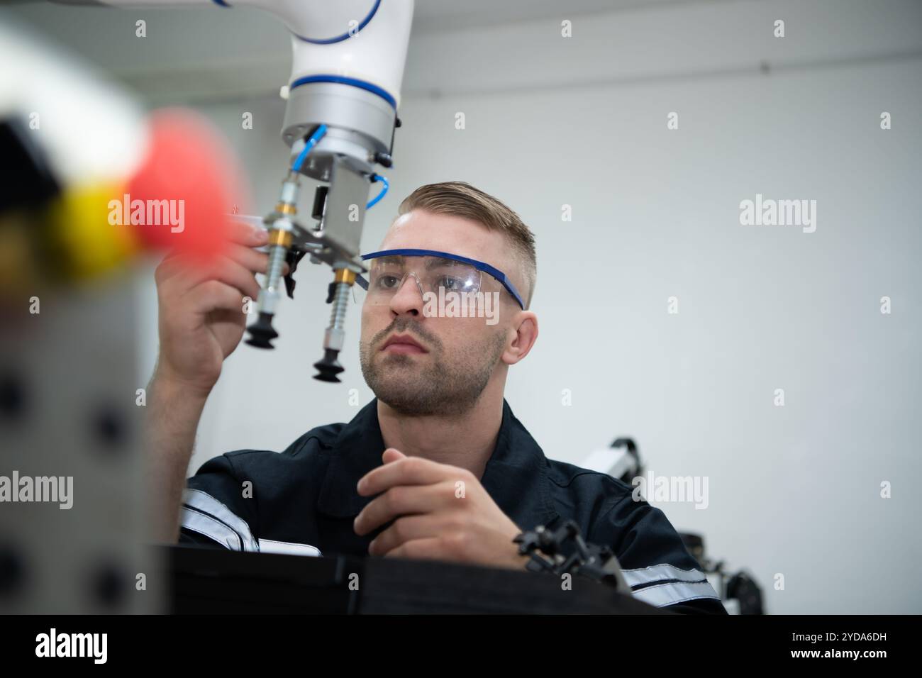 Students studying robotic hand technology are learning how to construct ...
