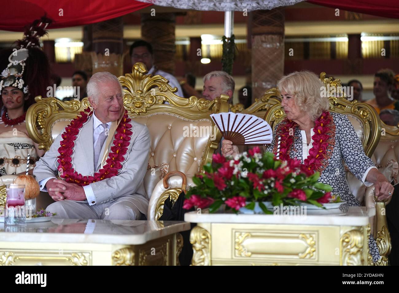 King Charles III and Queen Camilla laughing during a farewell ceremony ...