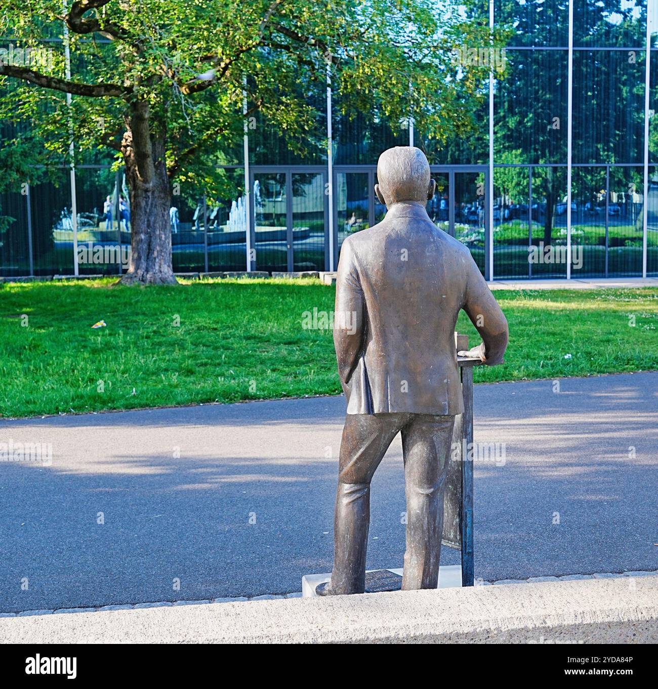 Walter Gropius figure at the fountain in the Dessau city park opposite ...