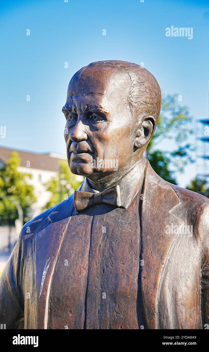Walter Gropius figure at the fountain in the Dessau city park opposite ...
