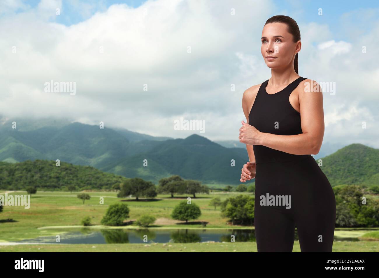 Woman jogging near lake hi-res stock photography and images - Alamy