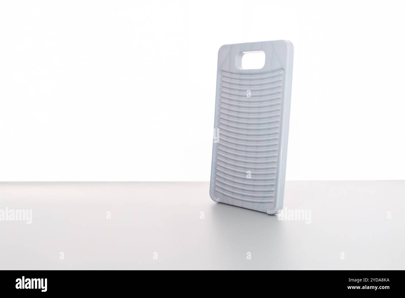 Plastic washboard, light gray, upright, flat surface, white background ...