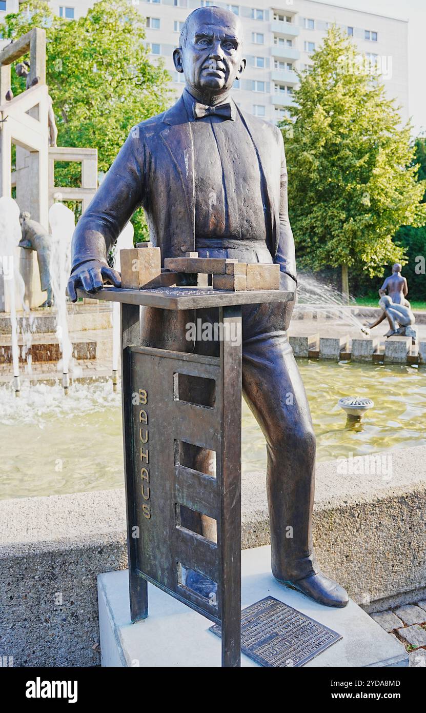 Walter Gropius figure at the fountain in the Dessau city park opposite ...