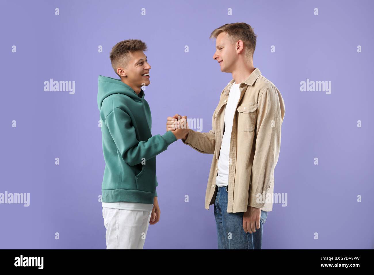 Clasping hands together hi-res stock photography and images - Alamy