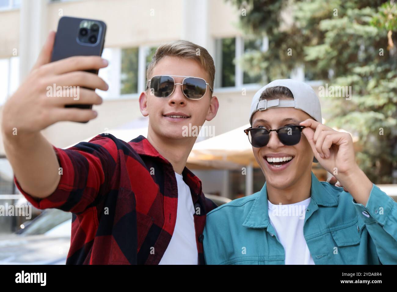 Happy brothers taking selfie hi-res stock photography and images - Alamy