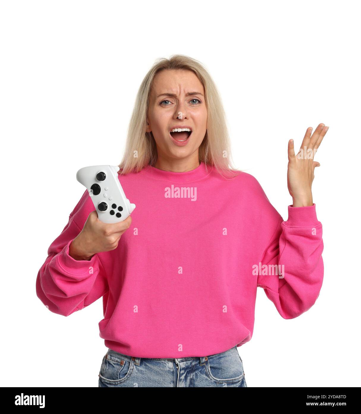 Emotional woman with controller on white background Stock Photo - Alamy