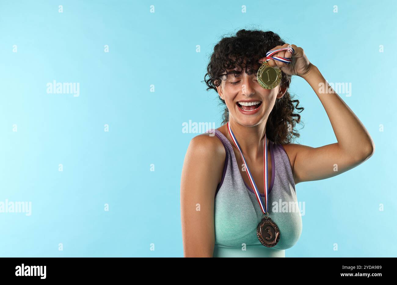 Happy winner different medals hi-res stock photography and images - Alamy