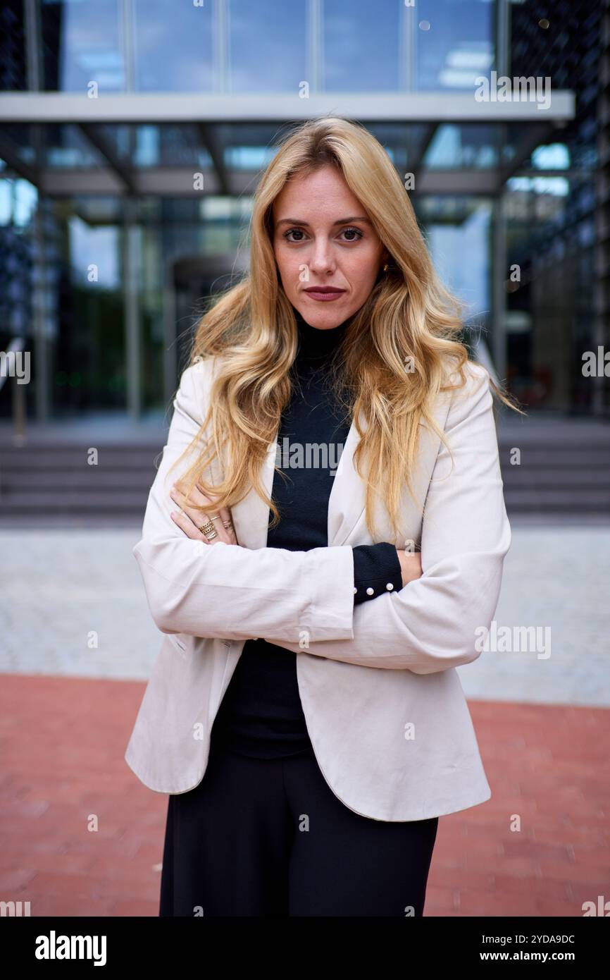 Portrait of beautiful Caucasian adult business woman in formal suit ...