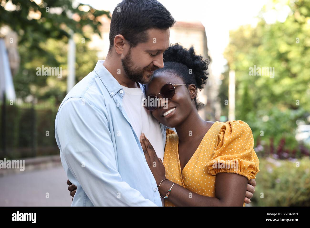 International relationships. Portrait of lovely couple outdoors Stock ...