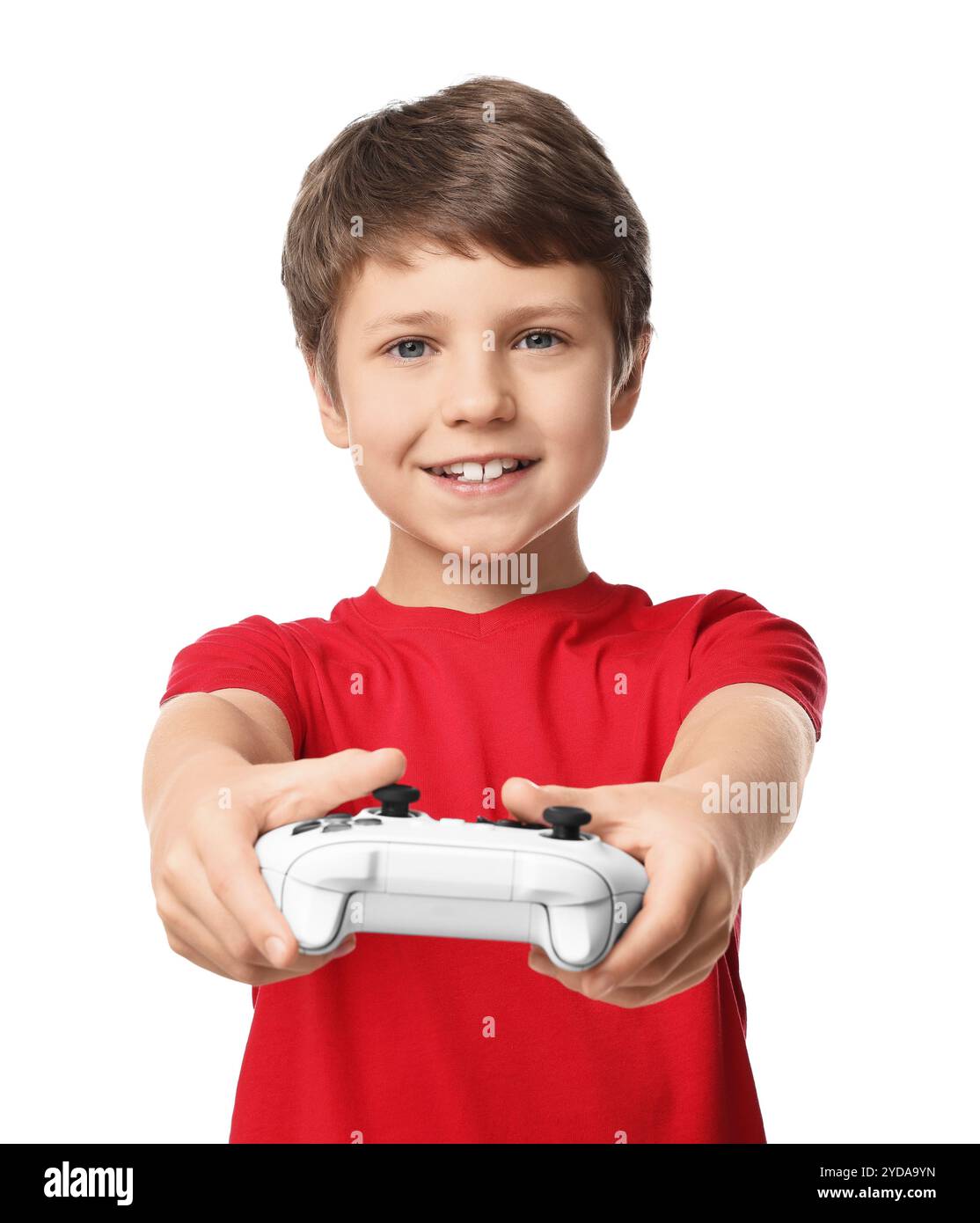 Happy little boy playing video game with controller on white background ...