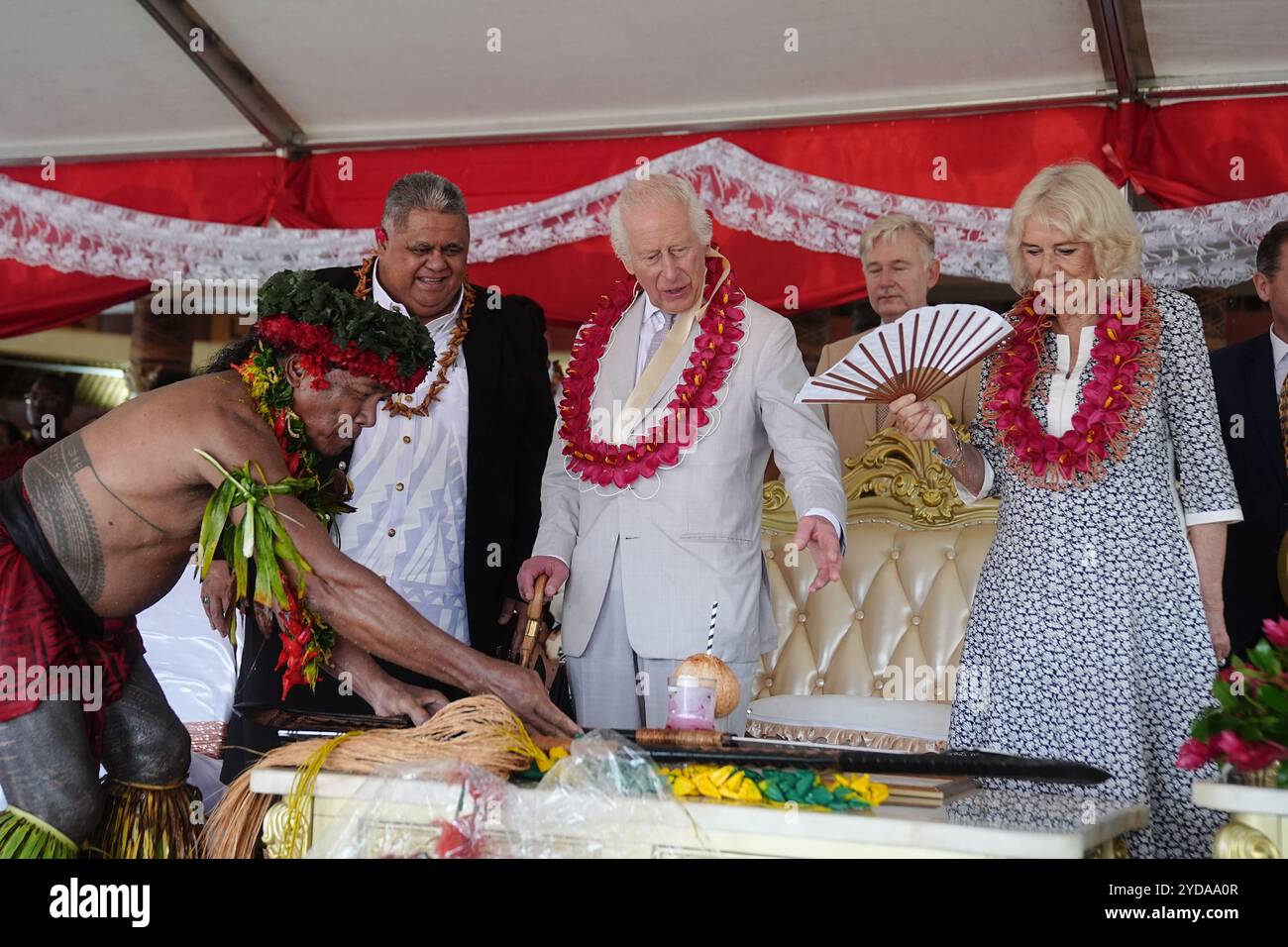 King Charles III and Queen Camilla laughing during a farewell ceremony ...