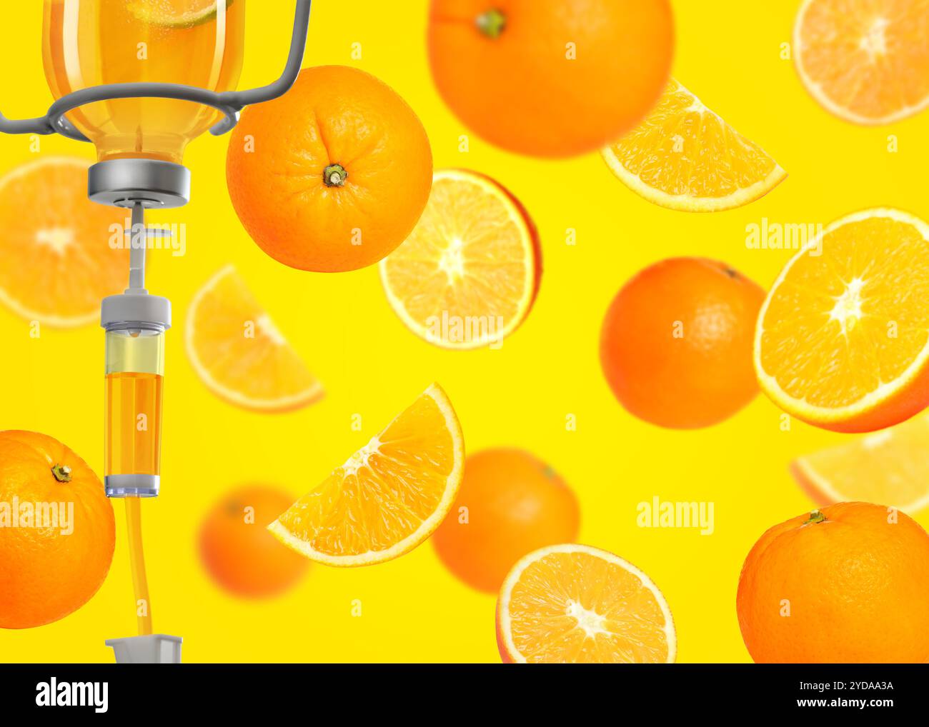 Vitamin intravenous therapy. IV infusion set and falling oranges on ...