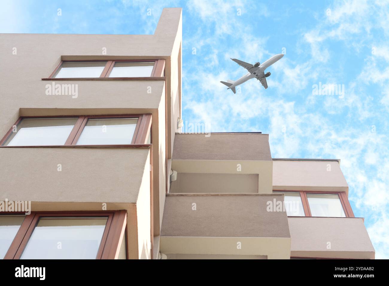 Airplane flying over residence hi-res stock photography and images - Alamy