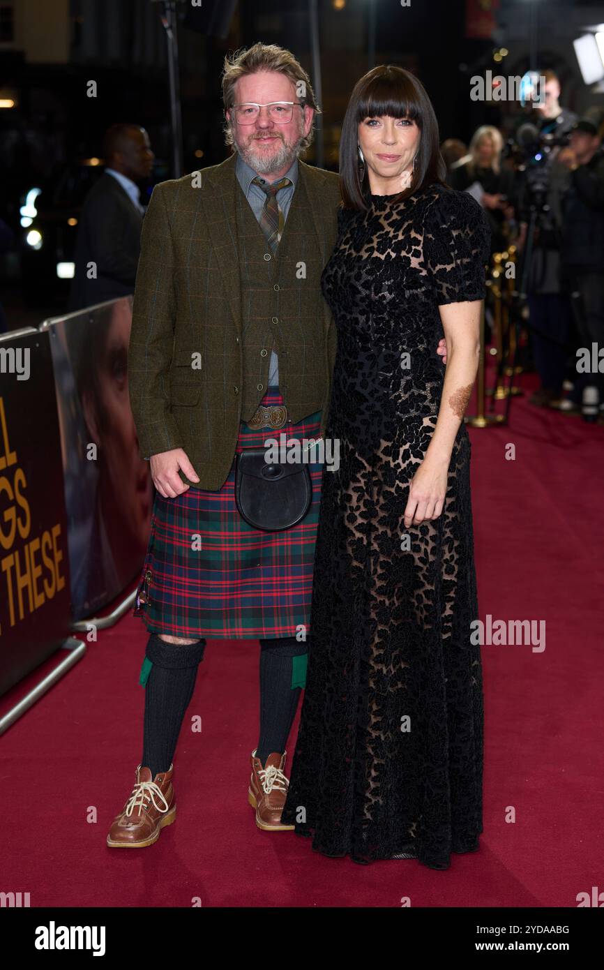 Stuart McCaffer, from left, Eileen Walsh pose for photographers upon ...