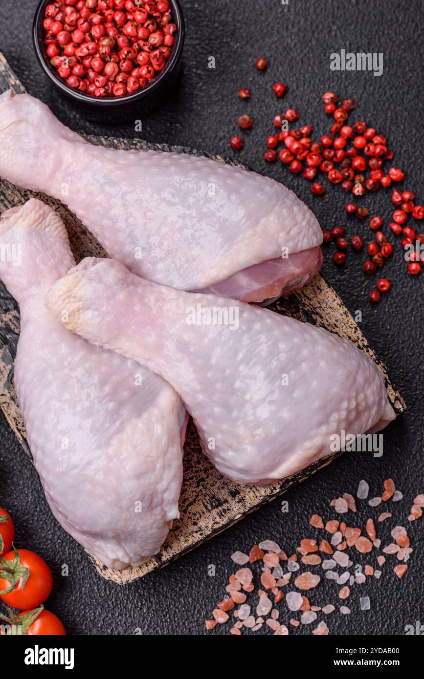 Fresh raw chicken legs with salt and spices Stock Photo - Alamy