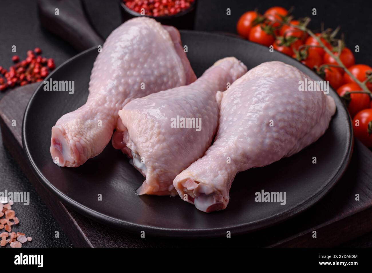 Fresh raw chicken legs with salt and spices Stock Photo - Alamy