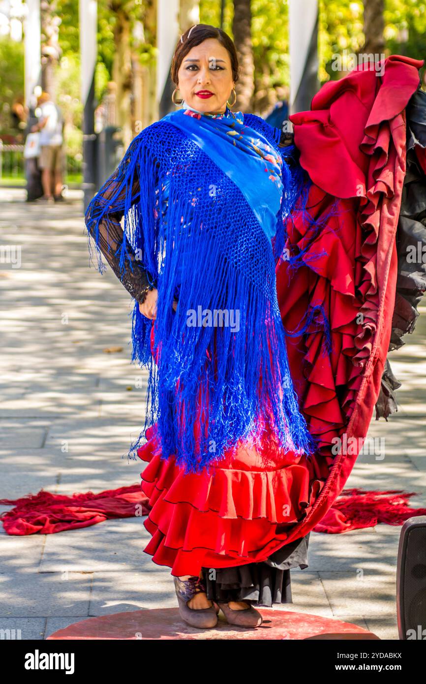 Female Flamenco performer and Hispalis Fountain in Puerta de Jerez ...