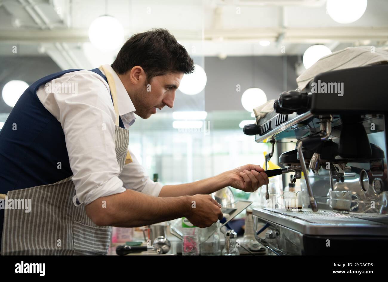 Coffee expert barista Making hot Americano for customers Stock Photo ...