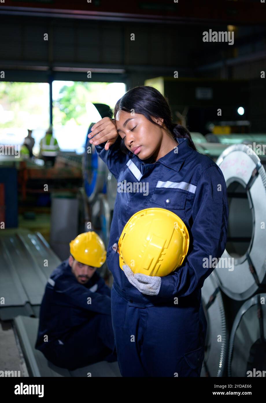 A group of heavy equipment engineers from large industries is taking a break after working hard ...