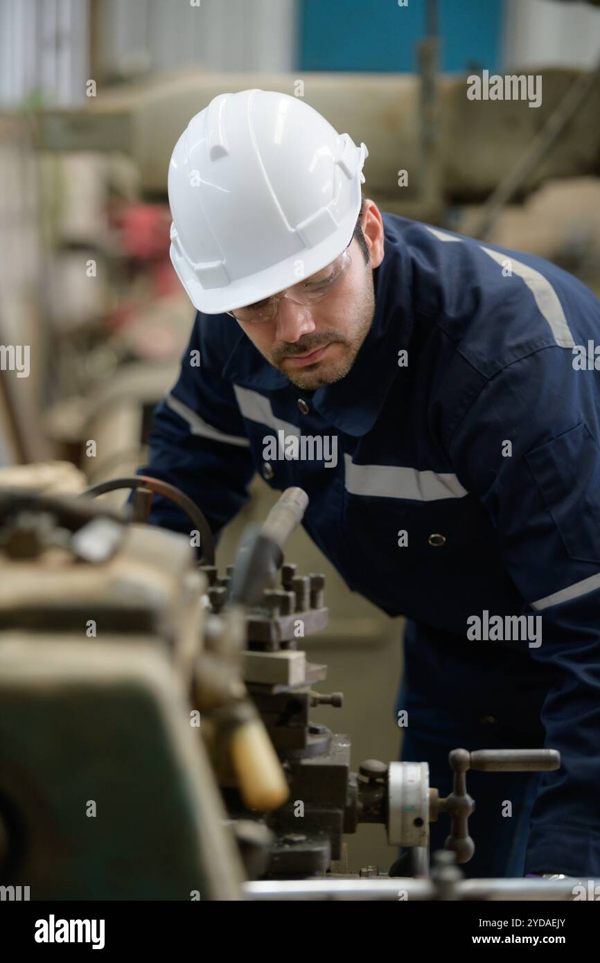 Young experienced engineers are maintaining and testing the operation ...