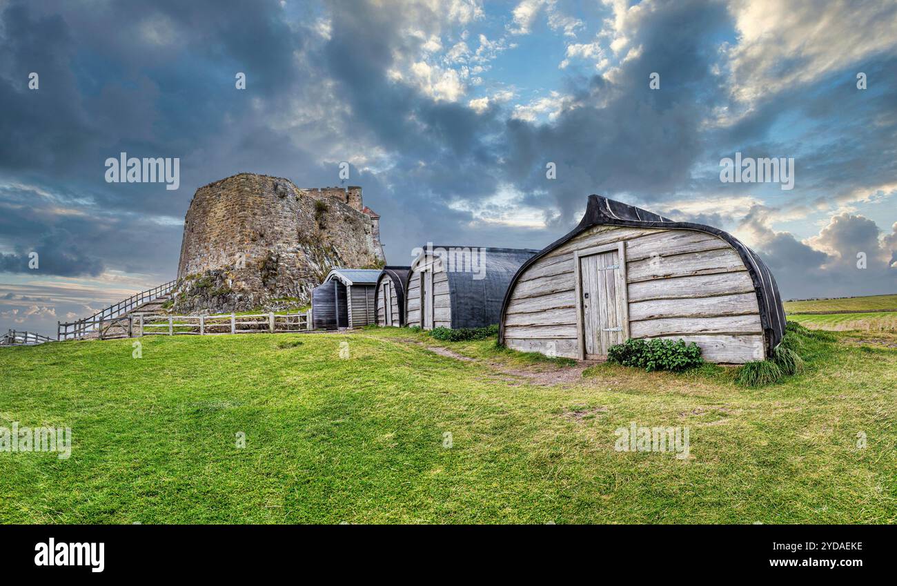 The image is of the medieval castle of Lindisfarne on Holy Island that ...