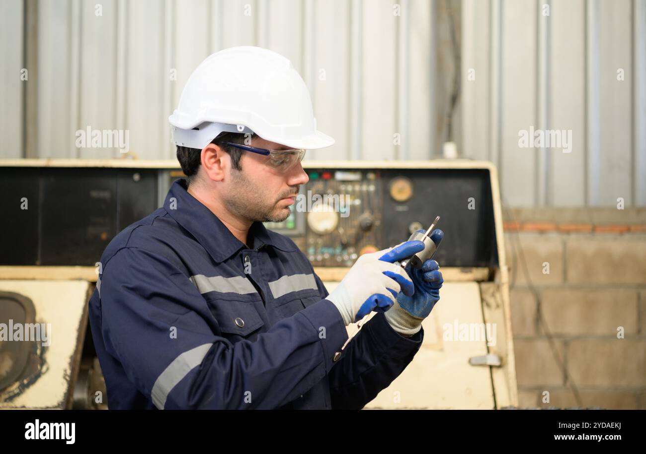 The chief mechanic works in a mechanical factory. Check the control ...