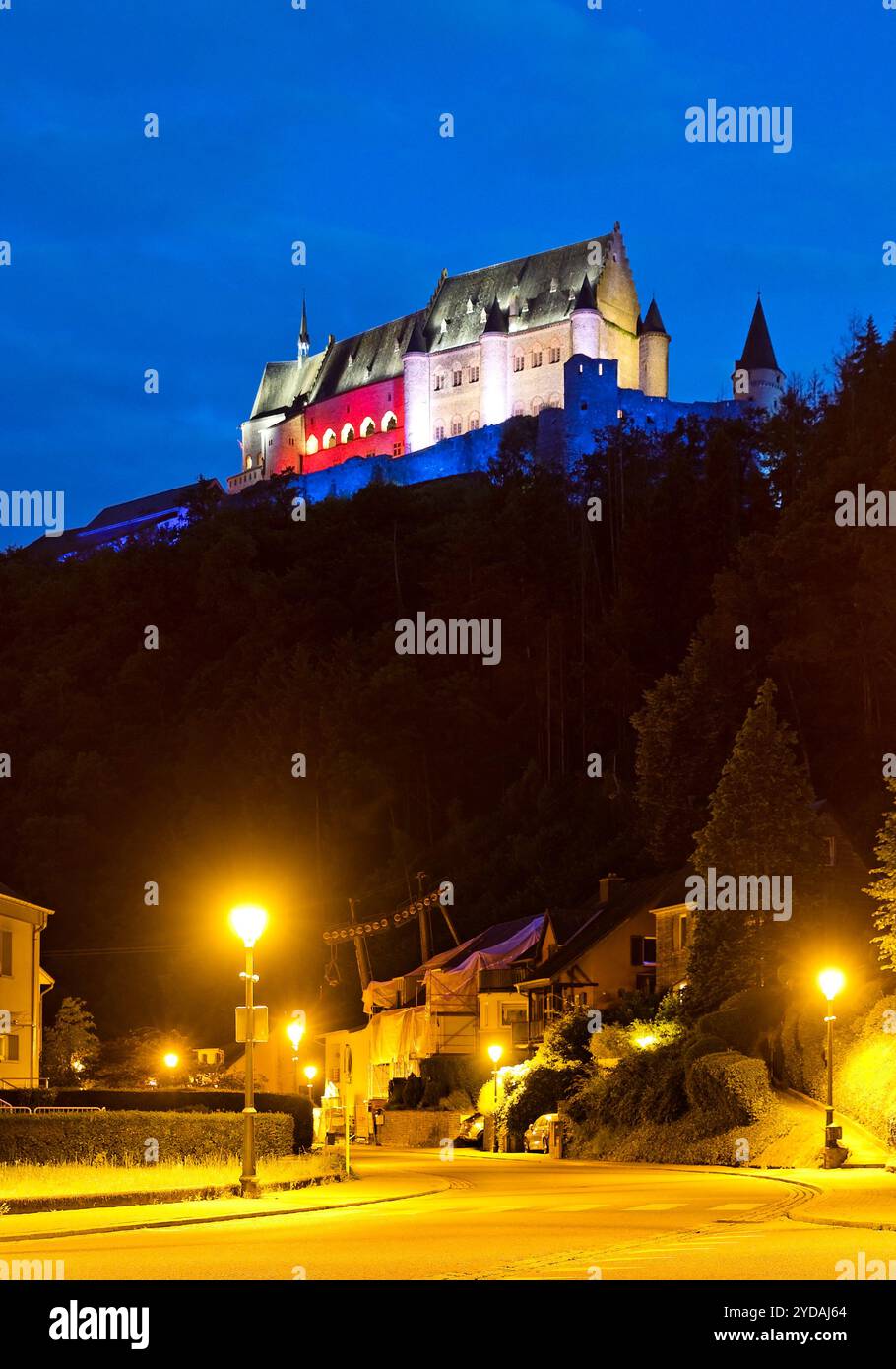 Vianden Castle, illuminated in the colors of the flag of Luxembourg on ...