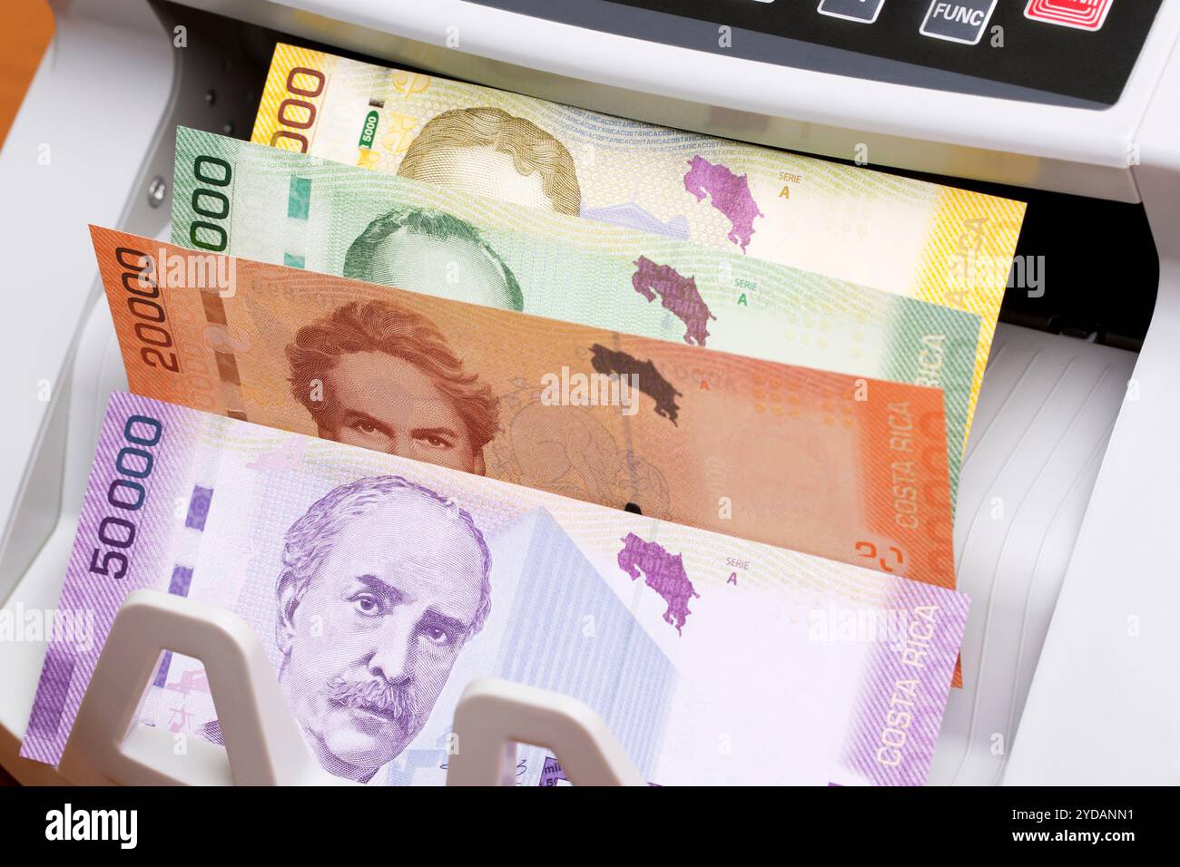 Costa Rican colon in the counting machine Stock Photo - Alamy